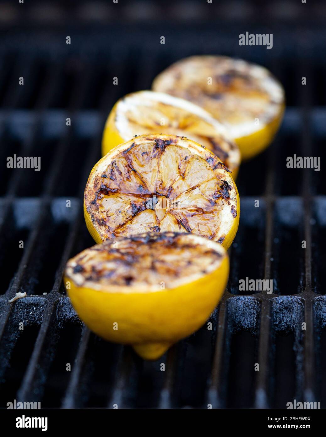 Grilled lemons on the grill Stock Photo - Alamy
