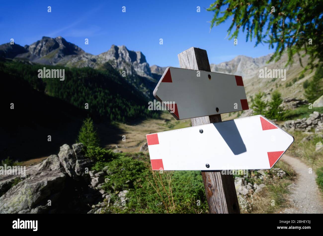 Mountain path signboard with blank trekking indication arrows Stock ...