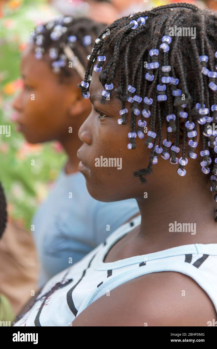 Portrait of a girl with decorations in her hair in the Garden of ...