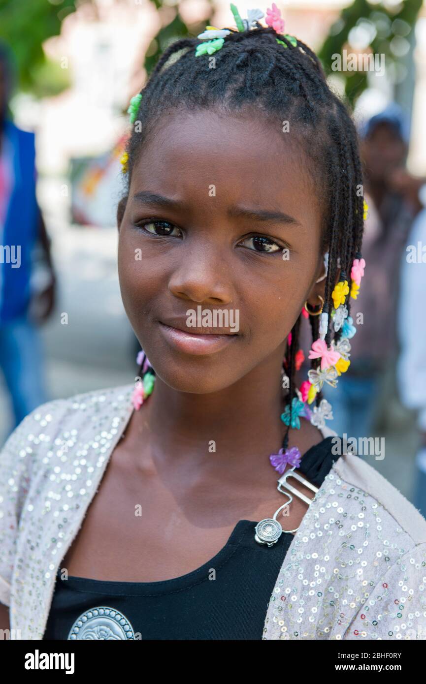 Portrait of a girl with decorations in her hair in the Garden of ...