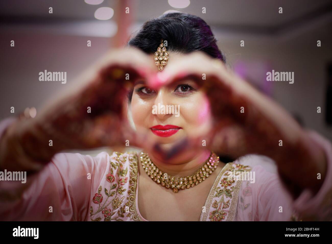 Indian hand heart hi-res stock photography and images - Alamy