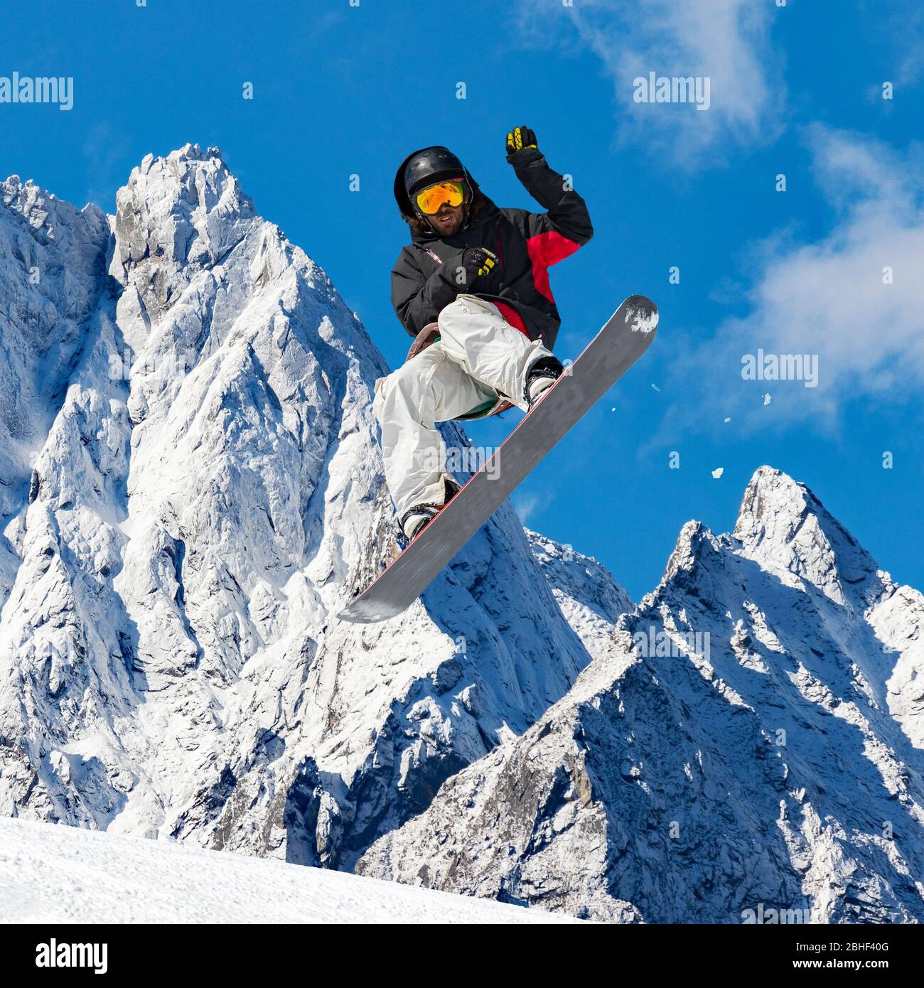snowboard jump in alpine landscape Stock Photo - Alamy