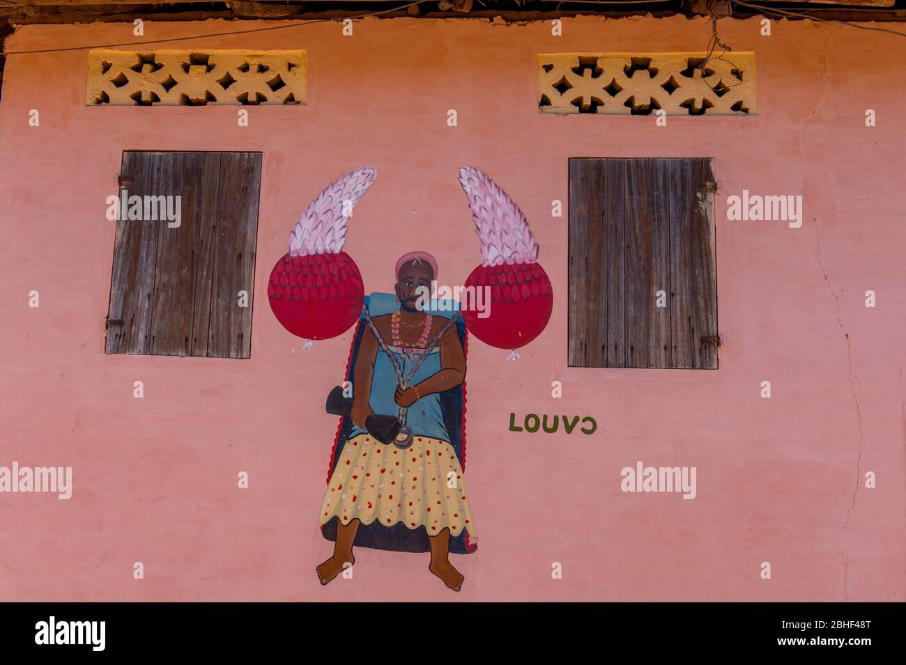 Street scene with paintings on Voodoo house in Ouidah, Benin Stock ...