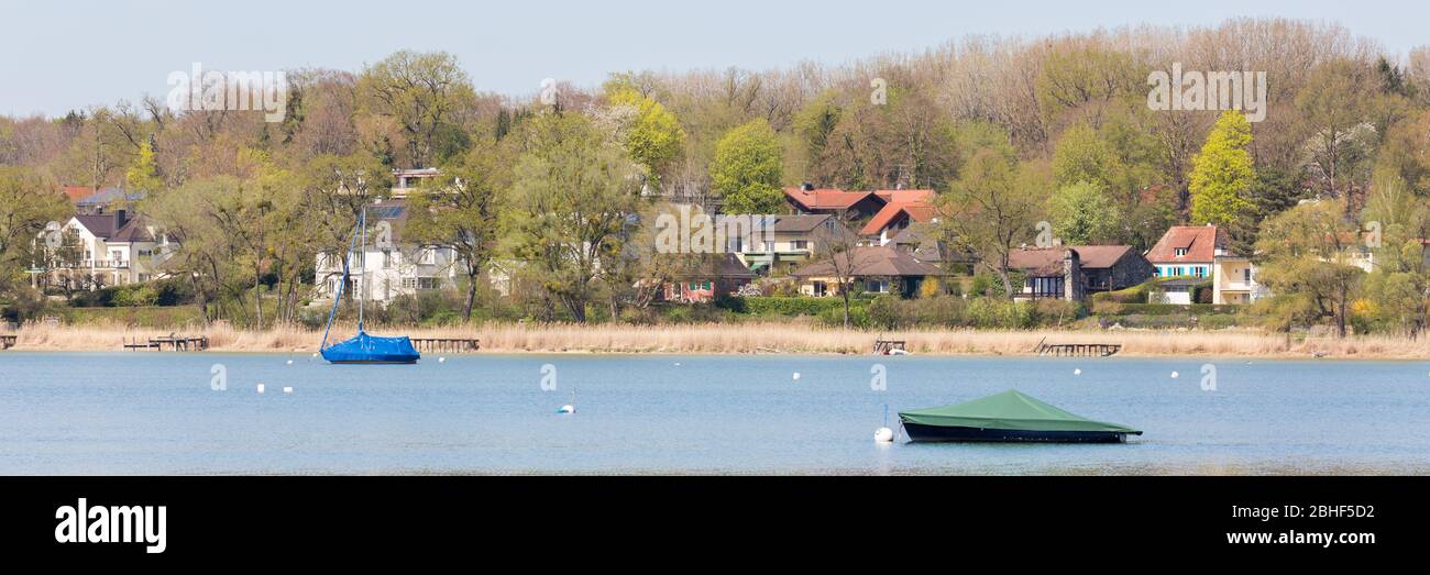 View of Lake Ammer (Ammersee) with two sailboats covered with ...