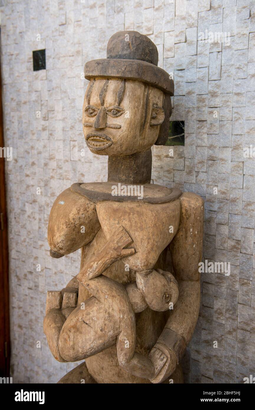 Wooden statue on display in the International Museum of Gulf of Guinea ...