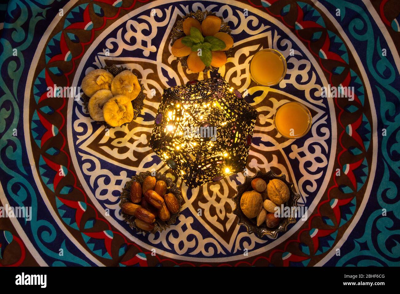 Ramadan Food - Table with arabian dates , dried fruits , and milk for ...