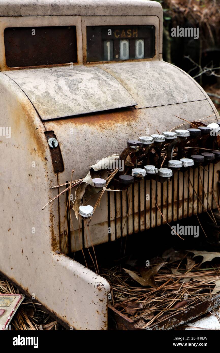Old-fashioned cash register sitting forgotten in a junk yard Stock ...