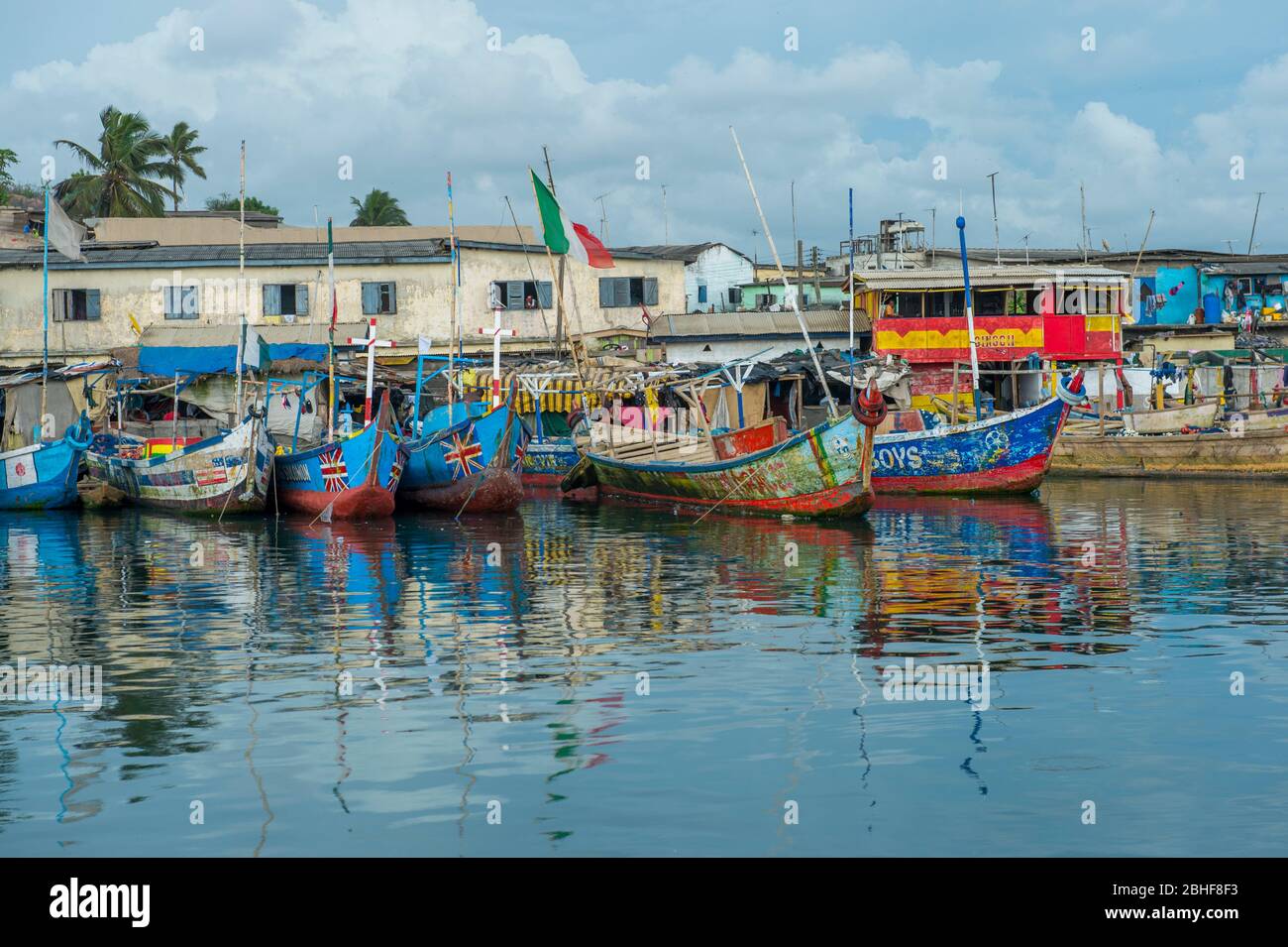 Wooden fishing boats in the fishing harbor of Elmina, Ghana Stock Photo ...