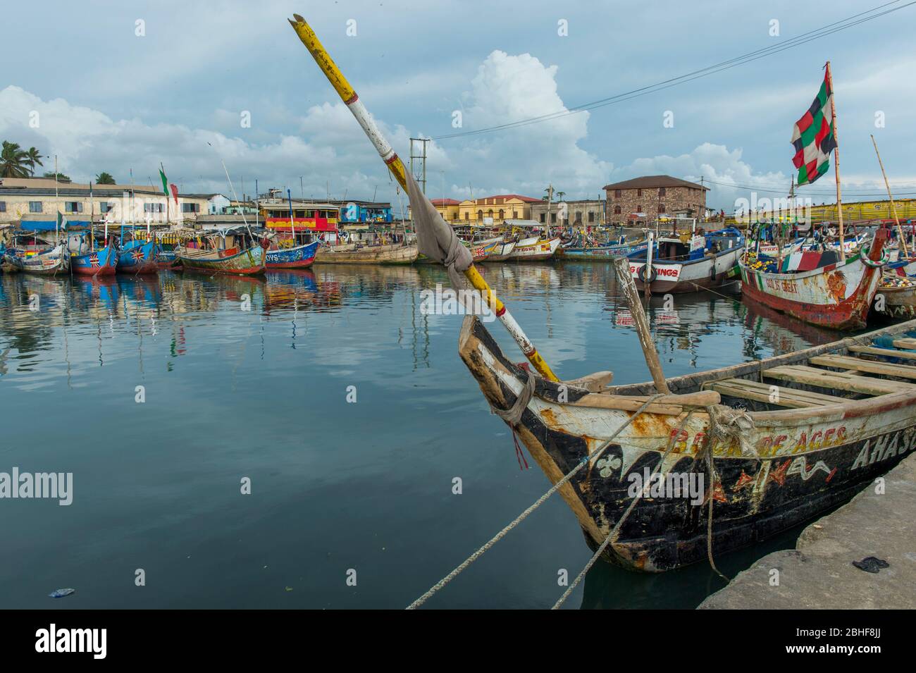 Wooden fishing boats in the fishing harbor of Elmina, Ghana Stock Photo ...