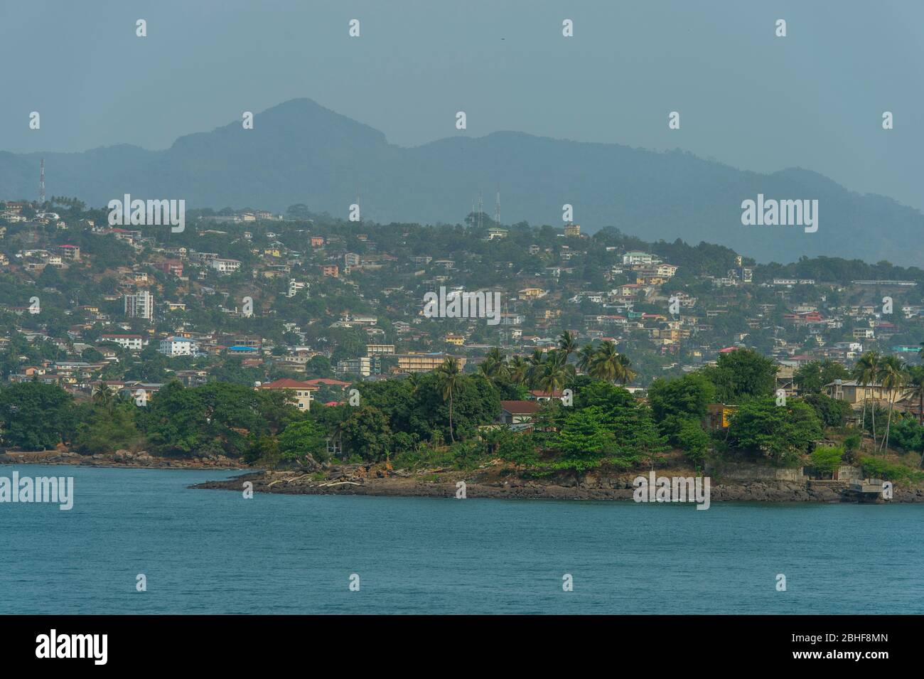 View from sea of the suburbs of Freetown, the capital city of Sierra ...