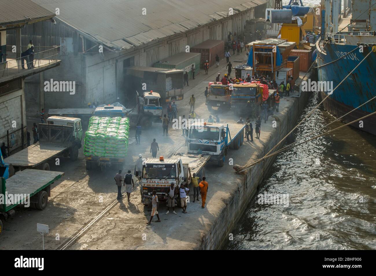 Rice being unloaded from freighter ship in the port of Freetown, the ...