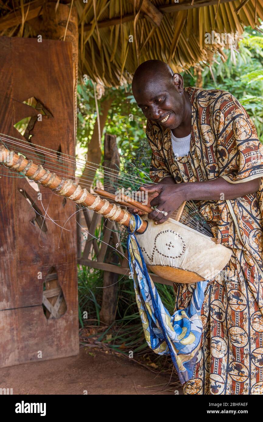 Man playing a Kora string instrument in Banjul, The Gambia Stock Photo ...