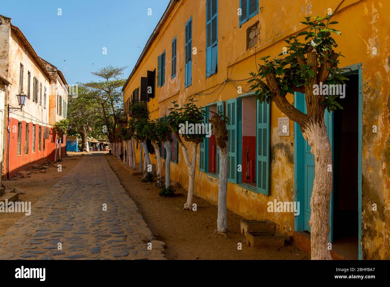 Colorful shutters of old colonial house now used as a school on Goree ...