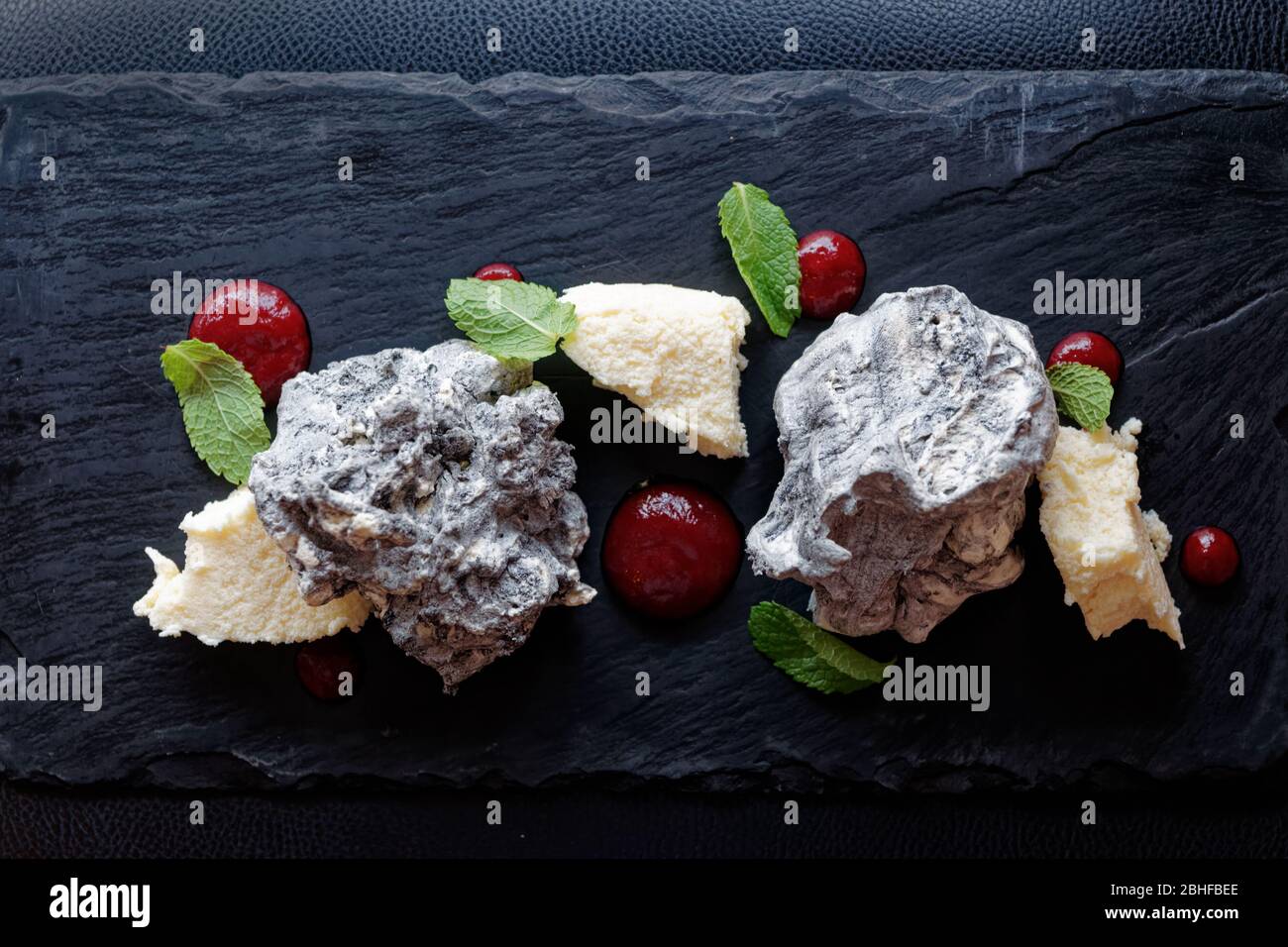 Dessert looking like stone on slate plate shot from above Stock Photo ...
