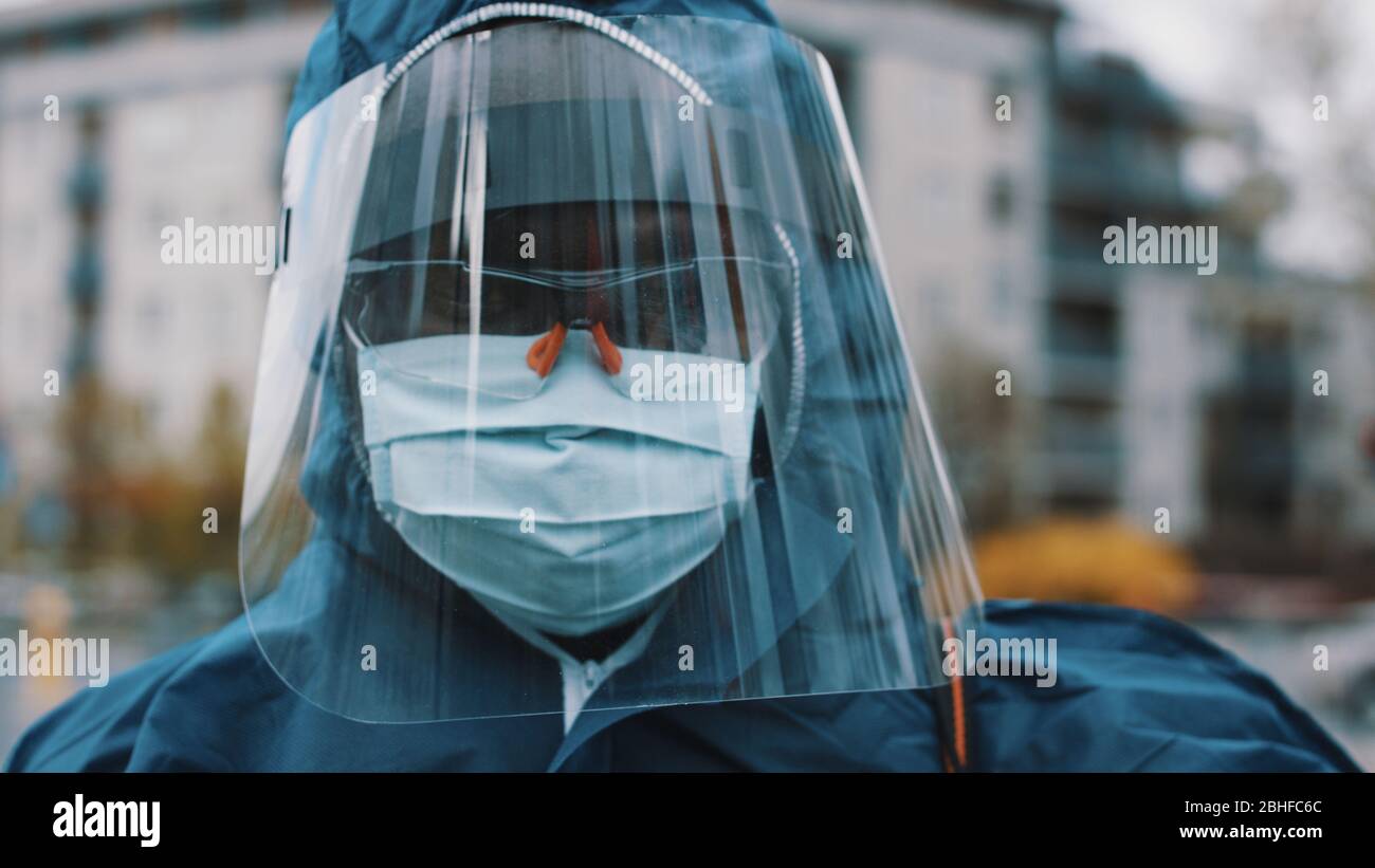 Portrait of an african man wearing NBC personal protective equipment ...