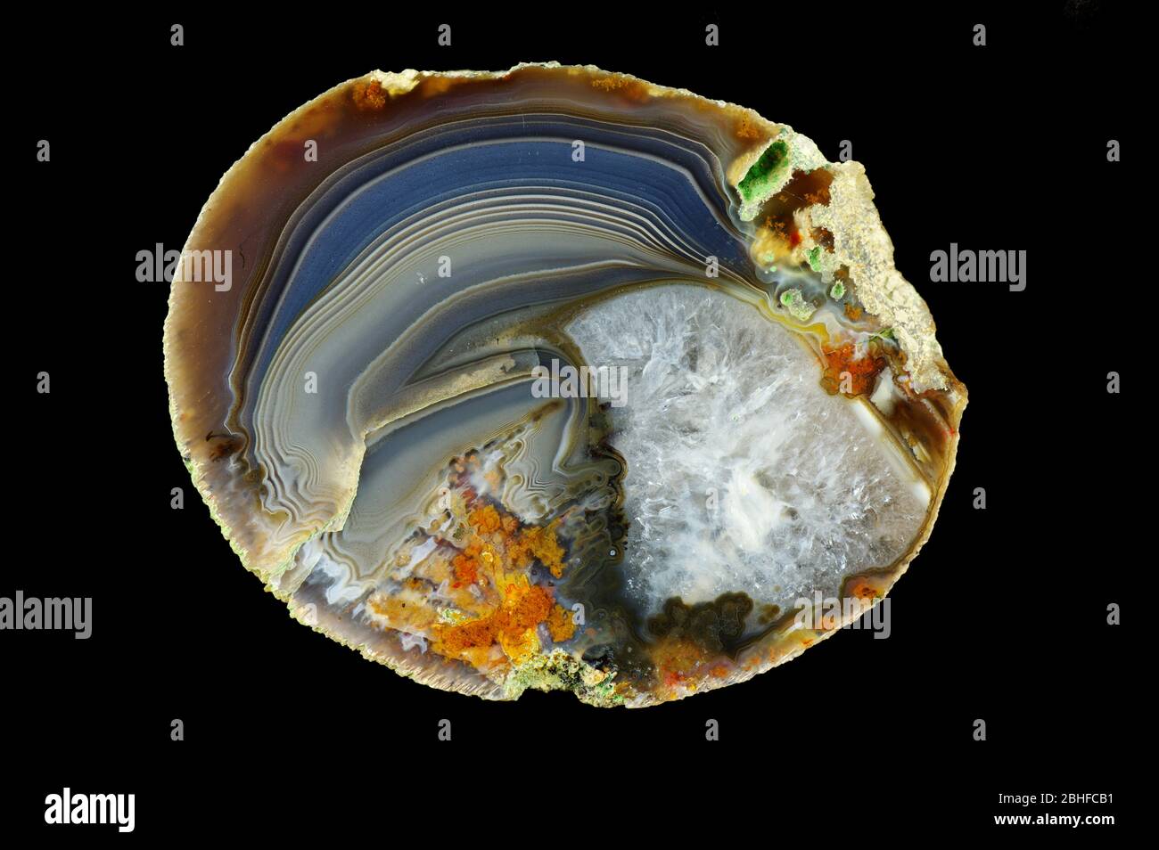 Spherical agate filled with quartz with many colorful inclusions ...