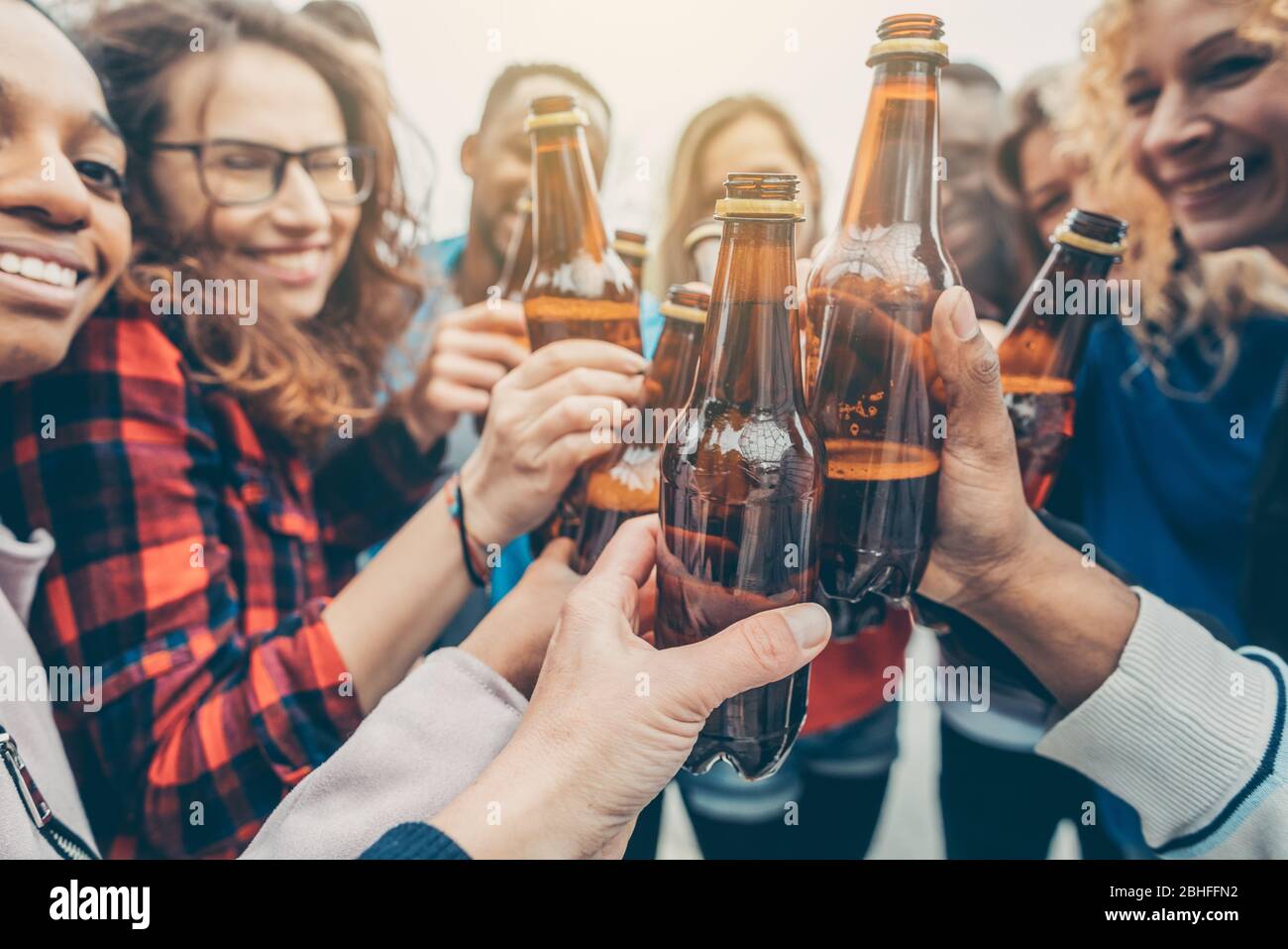 Friends having a beer together Stock Photo - Alamy