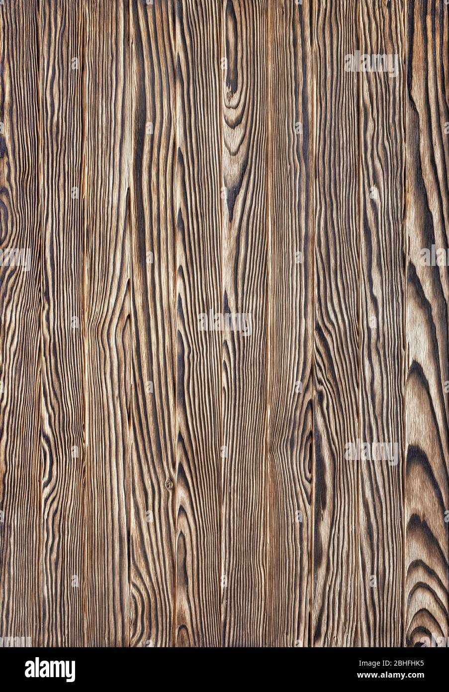 Old wood brown burned plank board of pine tree, texture and background ...