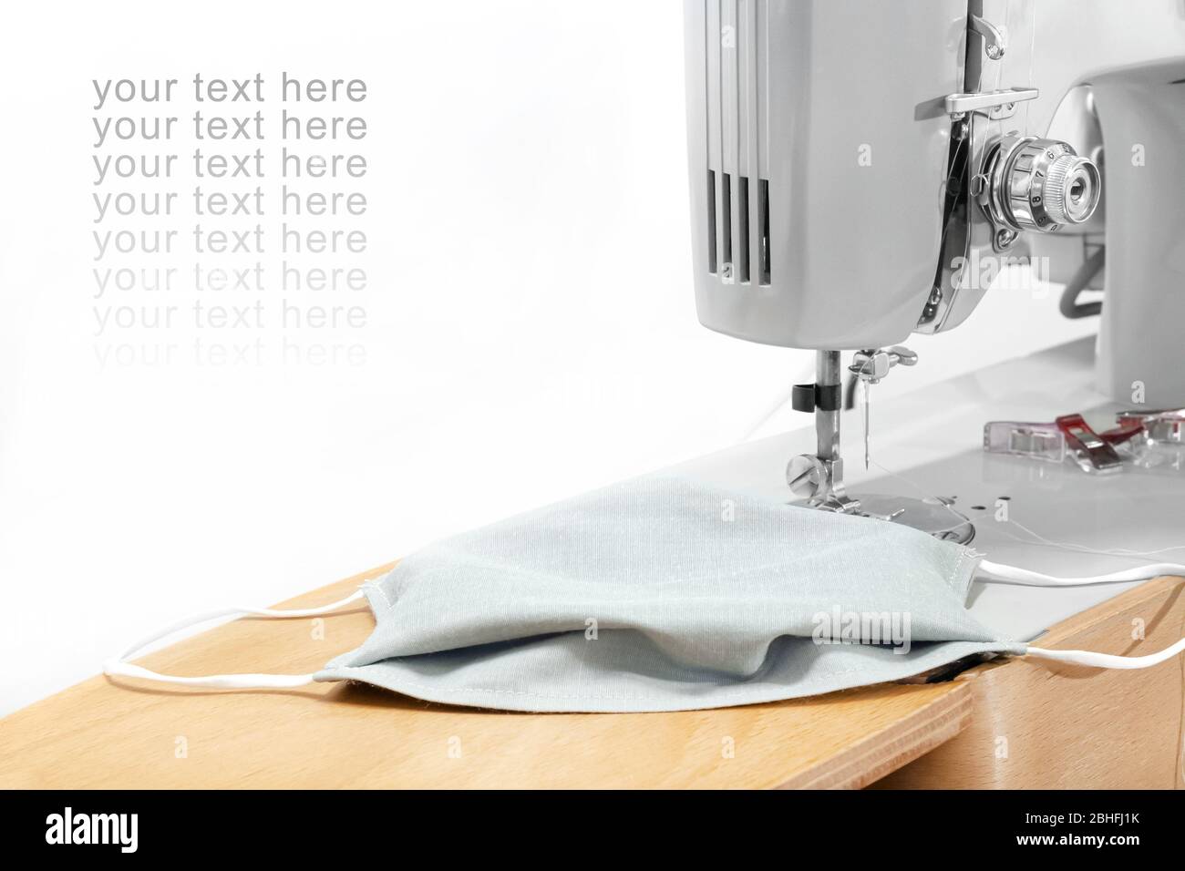 Sewing reusable handmade cloth face masks. Making home made breathing ...