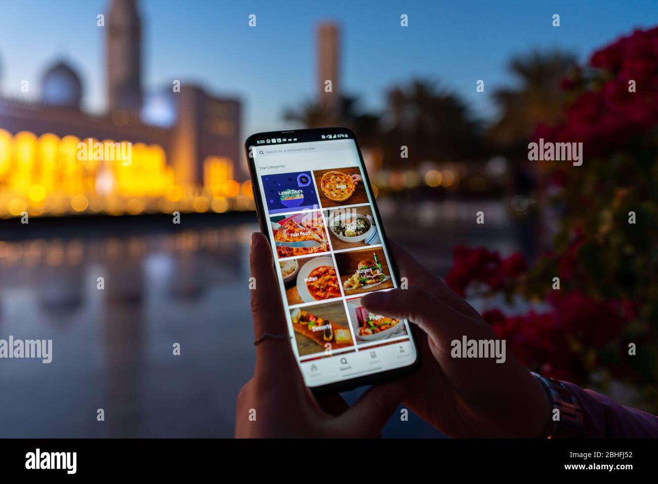 A person scrolling through food option and categories | online food ...