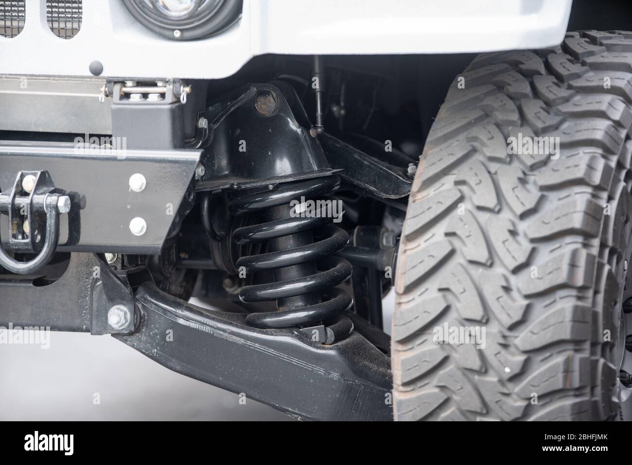 Industrial heavy duty spring suspension on a military suv vehicle Stock ...