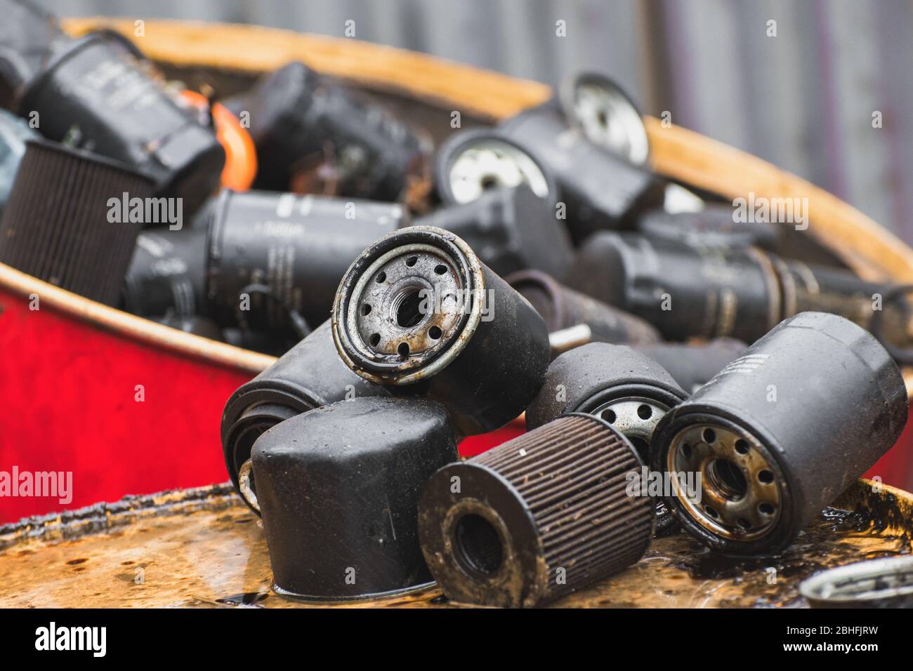 group of old oil filters of the car with a shallow depth of field Stock ...
