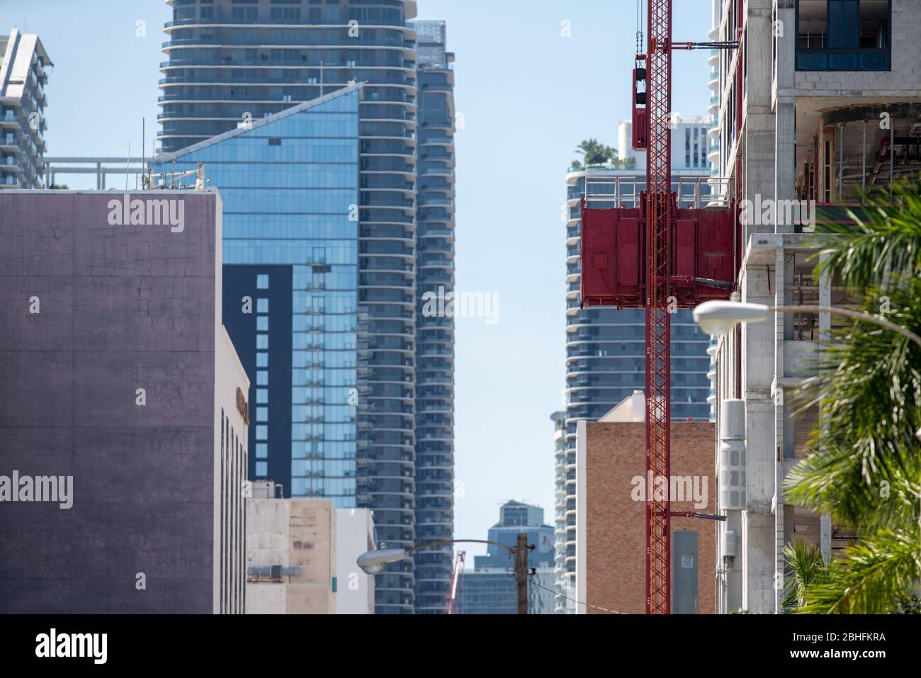 Exterior construction elevator connected to a building under ...