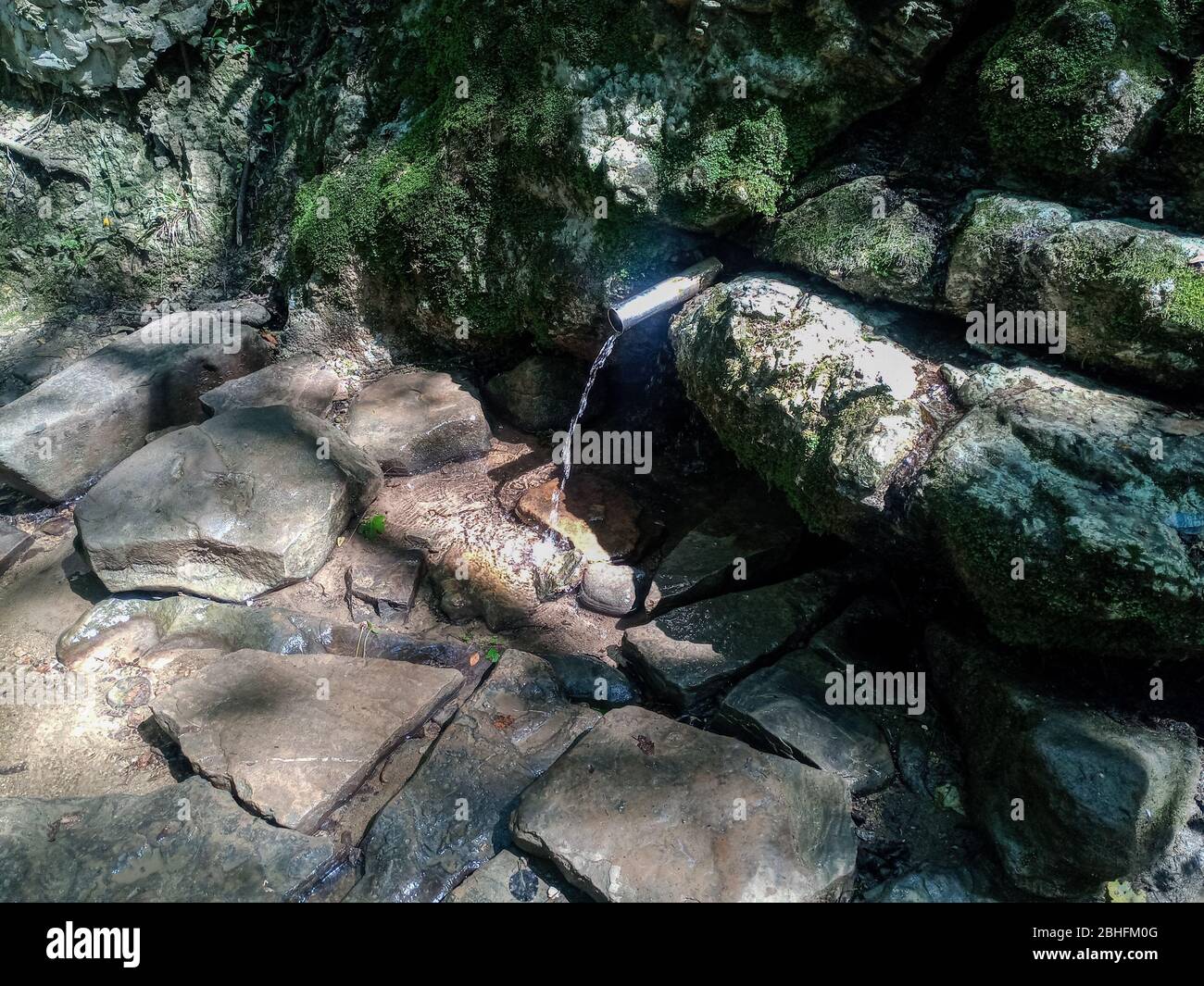 a tube inserted into the spring for the convenience of a set of ...