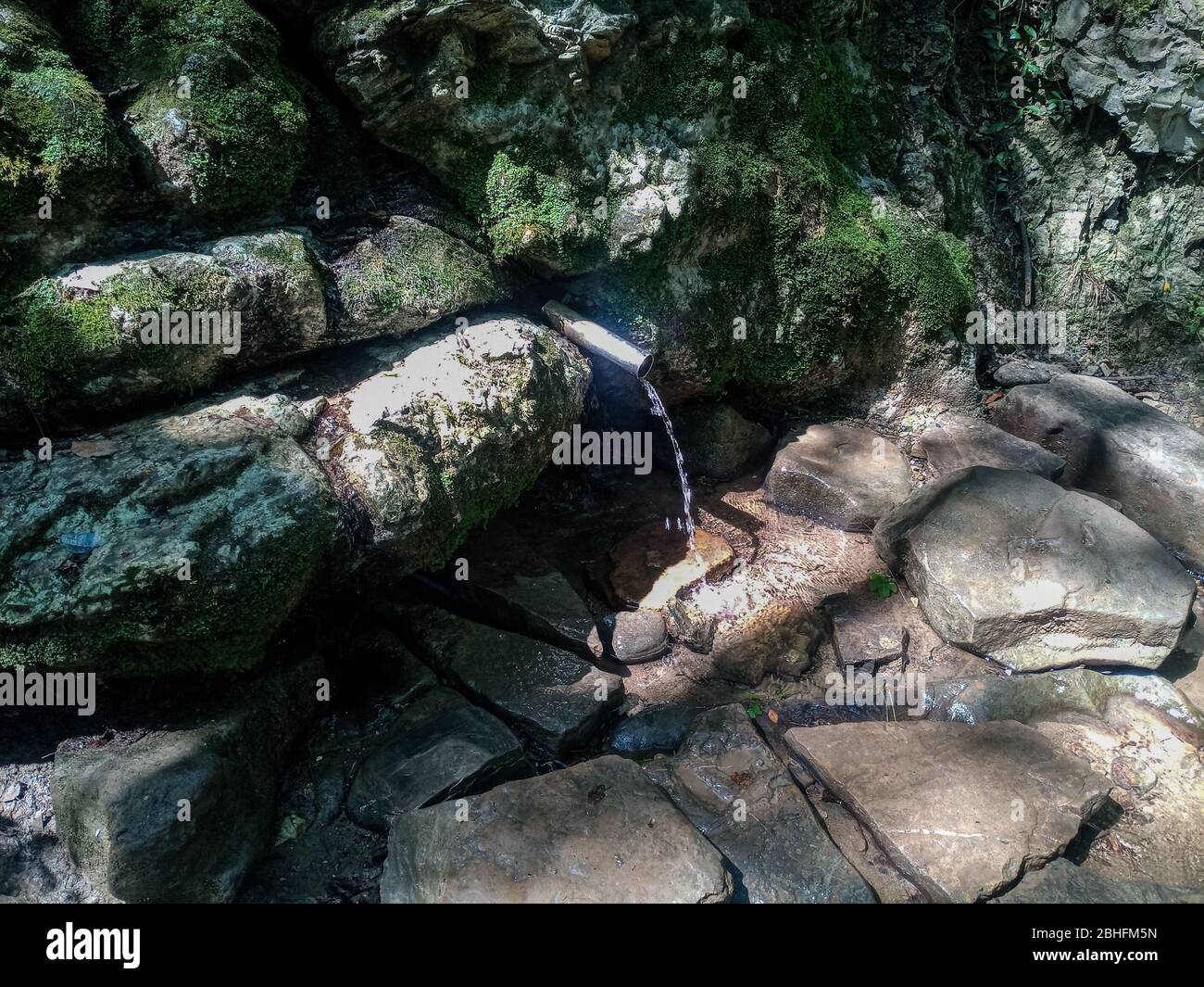 a tube inserted into the spring for the convenience of a set of ...