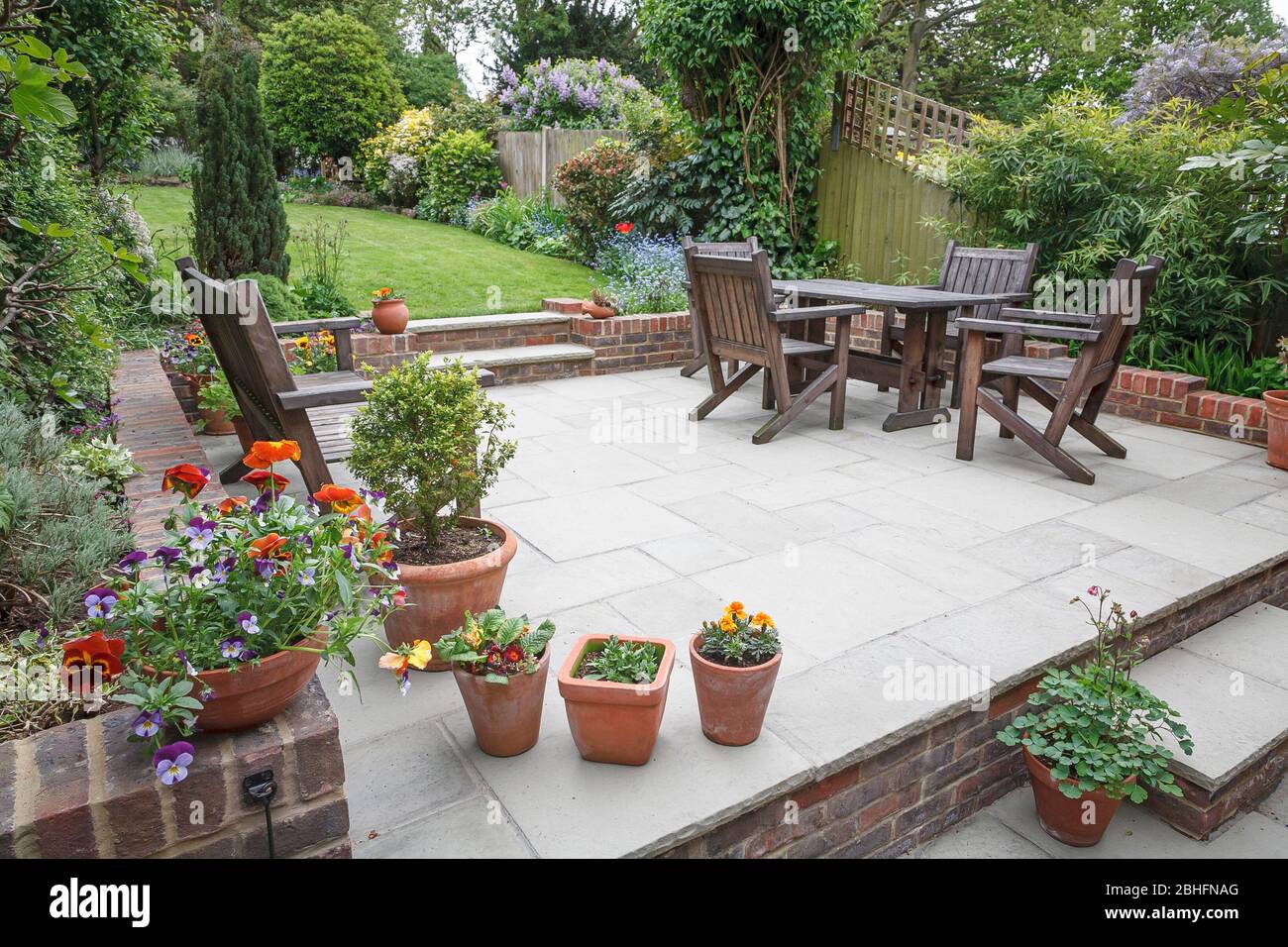 Hard landscaping, new luxury stone patio and garden of an English home ...