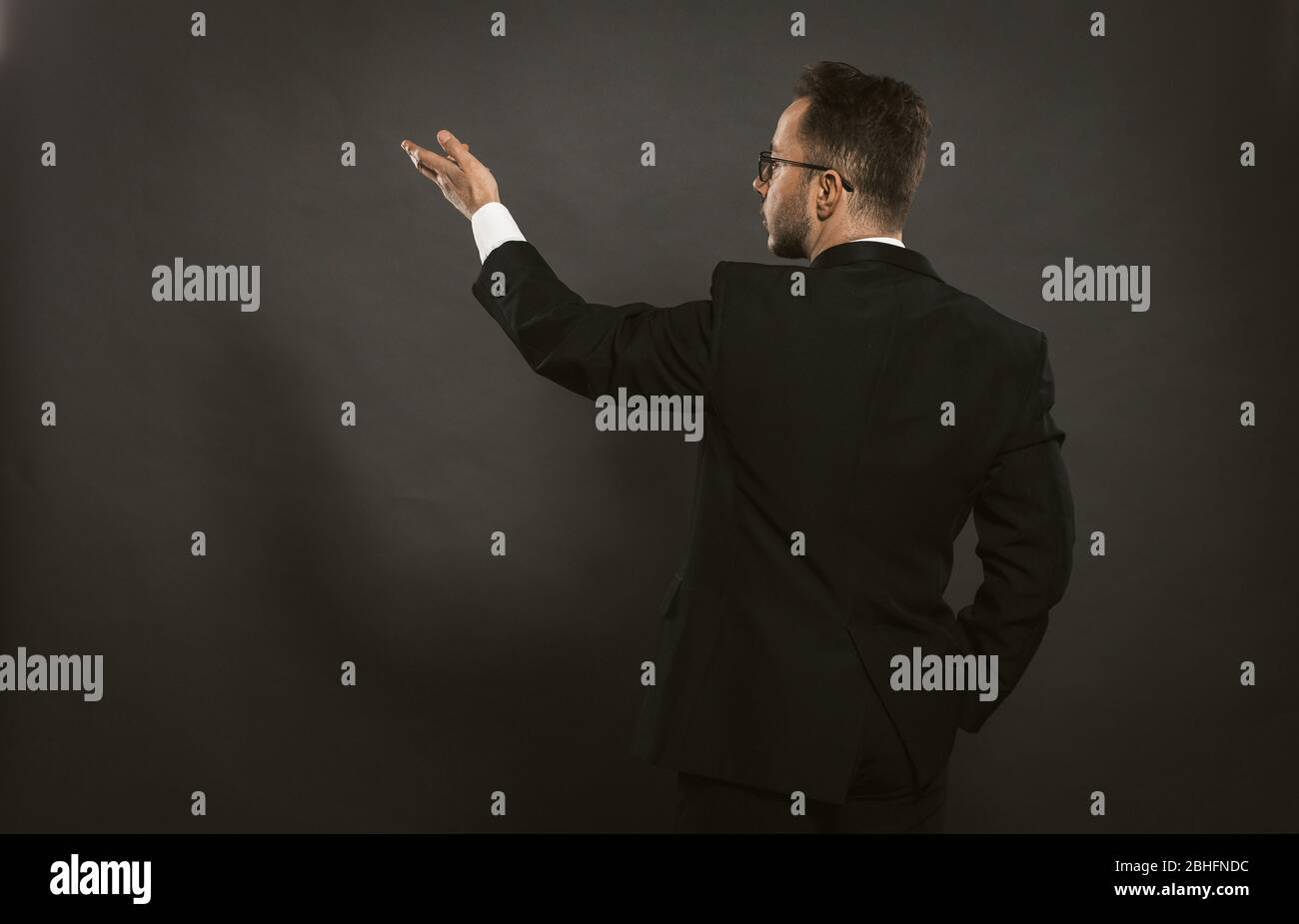 Businessman hand sign for concept design Stock Photo - Alamy