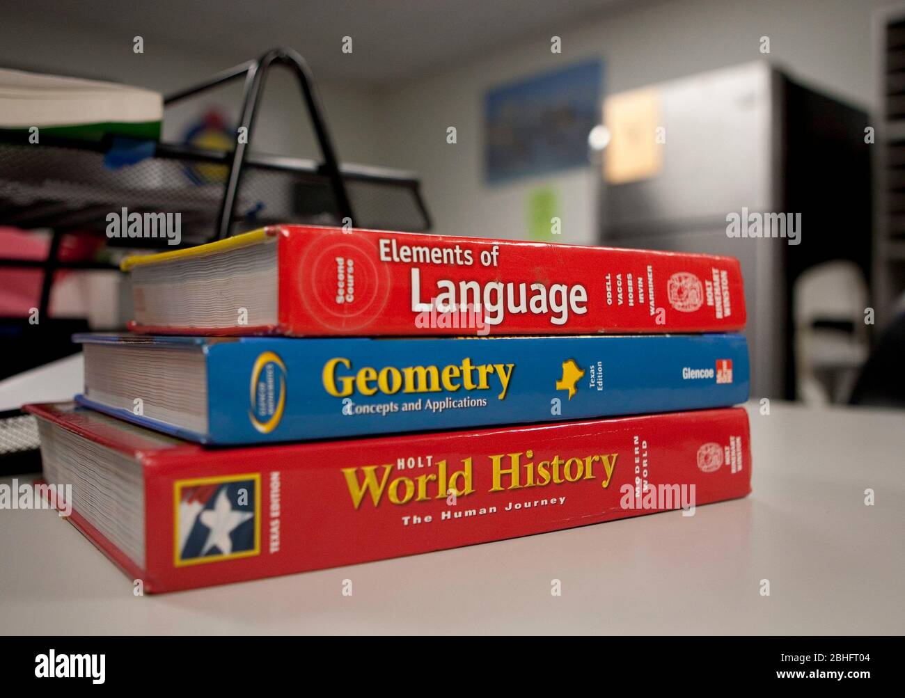 Stack Of High School Textbooks