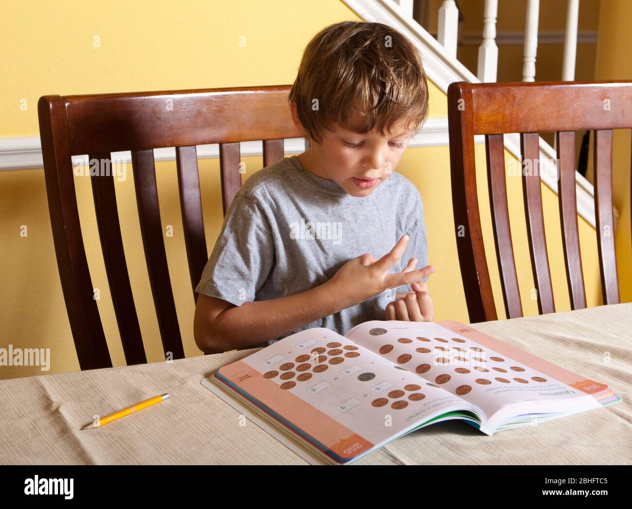 Using math skills hi-res stock photography and images - Alamy