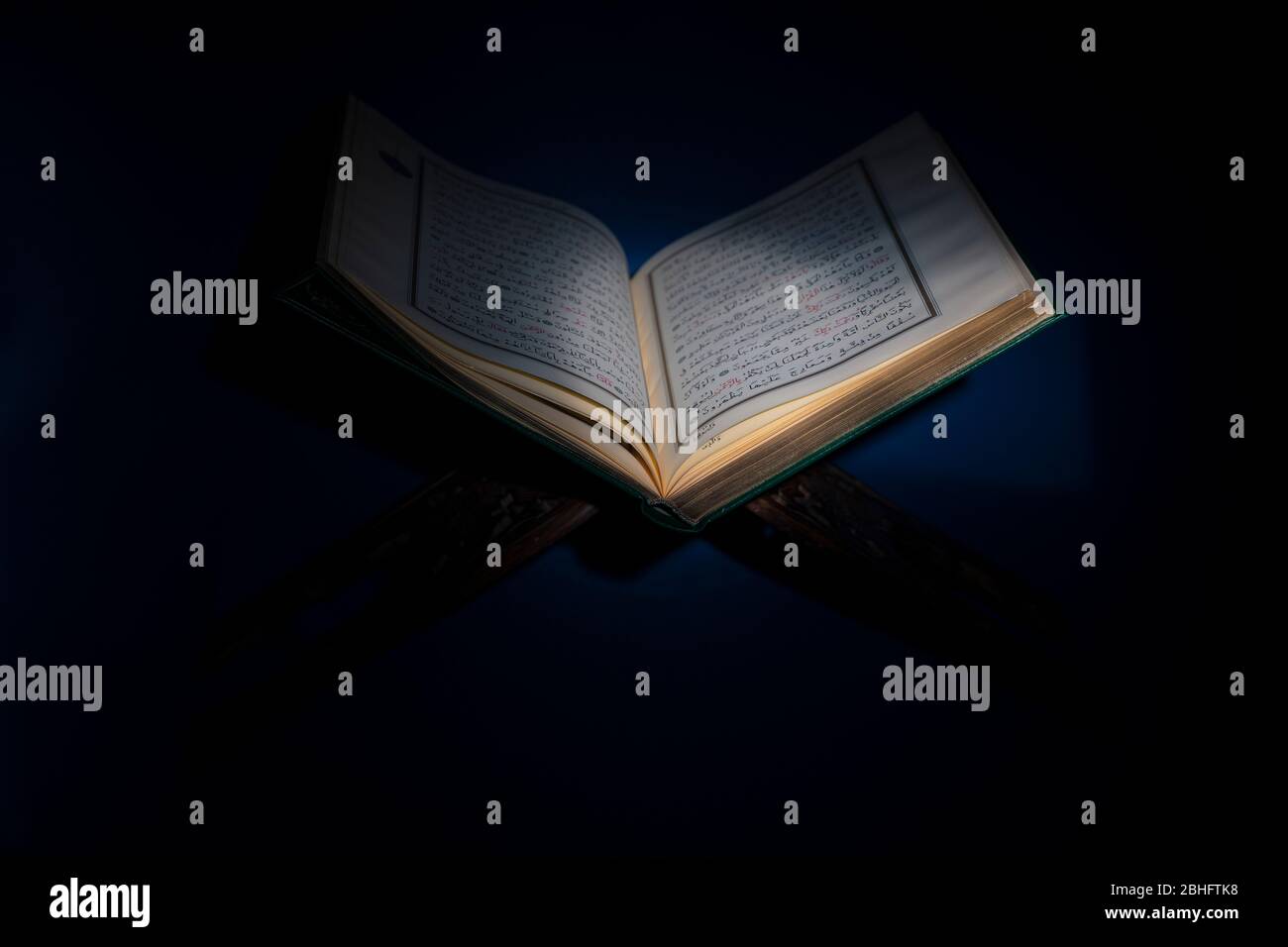Istanbul, Turkey - June 1, 2018; An open page of Quran shows Surah Al ...