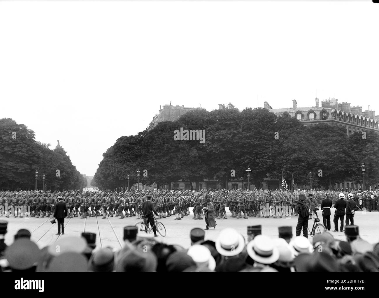 U.S. Infantry marching down Champs Elysees during 4th of July Parade ...
