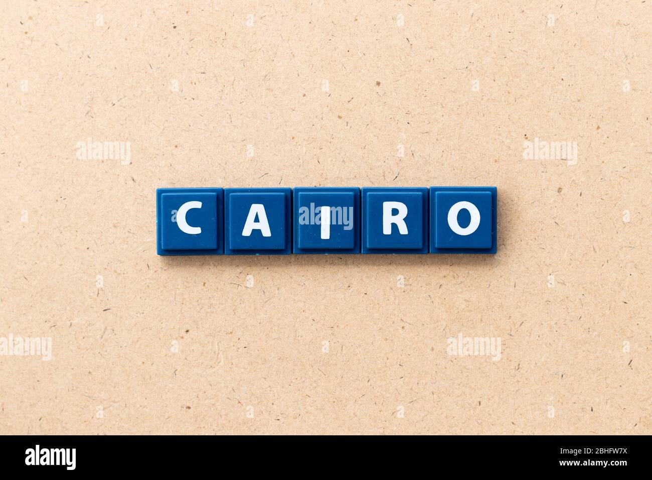 Tile letter in word Cairo on wood background Stock Photo - Alamy