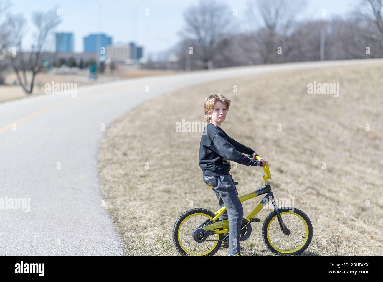 Child riding on a bicycle hi-res stock photography and images - Alamy