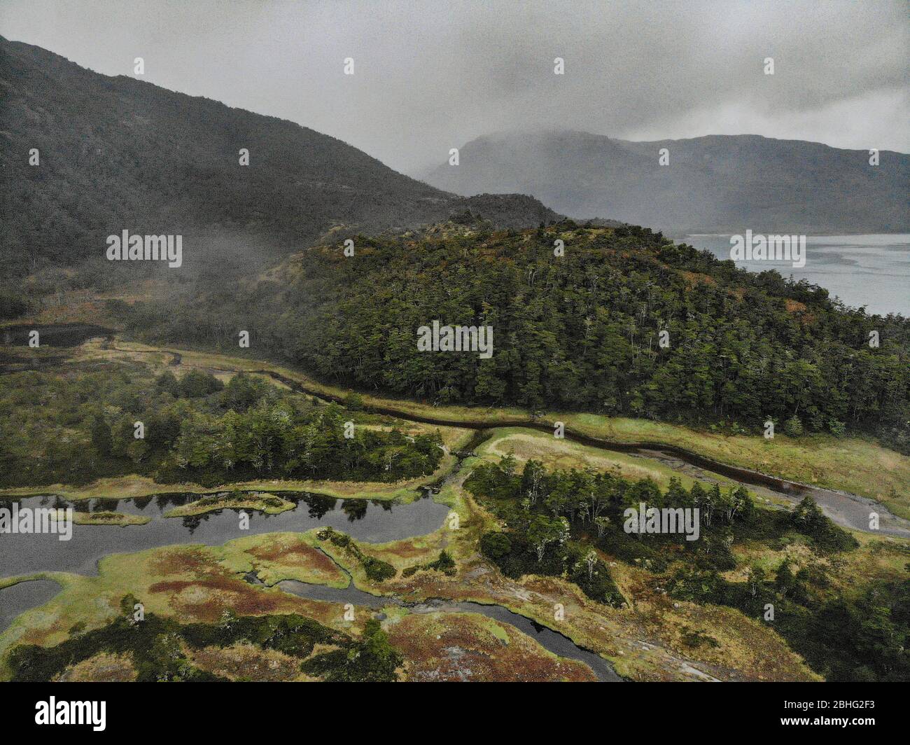 Aerial view of Ainsworth Bay. The coastal inlet of Ainsworth Bay is fed ...
