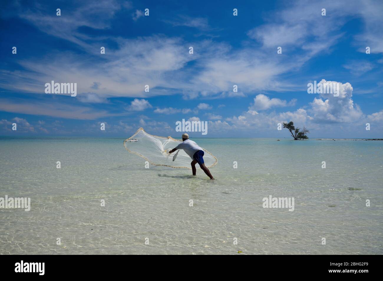 Fisherman releasing fish hi-res stock photography and images - Alamy