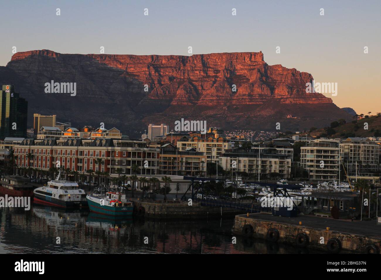 Dawn in mountain city hi-res stock photography and images - Alamy