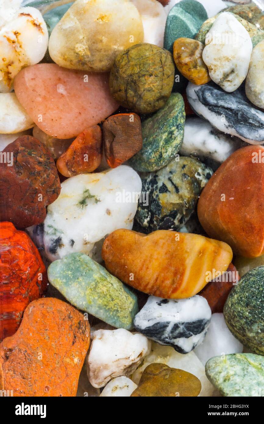 close up of a bunch of small naturally polished stones found in the ...