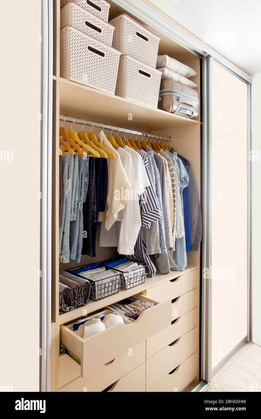 Wardrobe with perfect order clothes shades Stock Photo - Alamy
