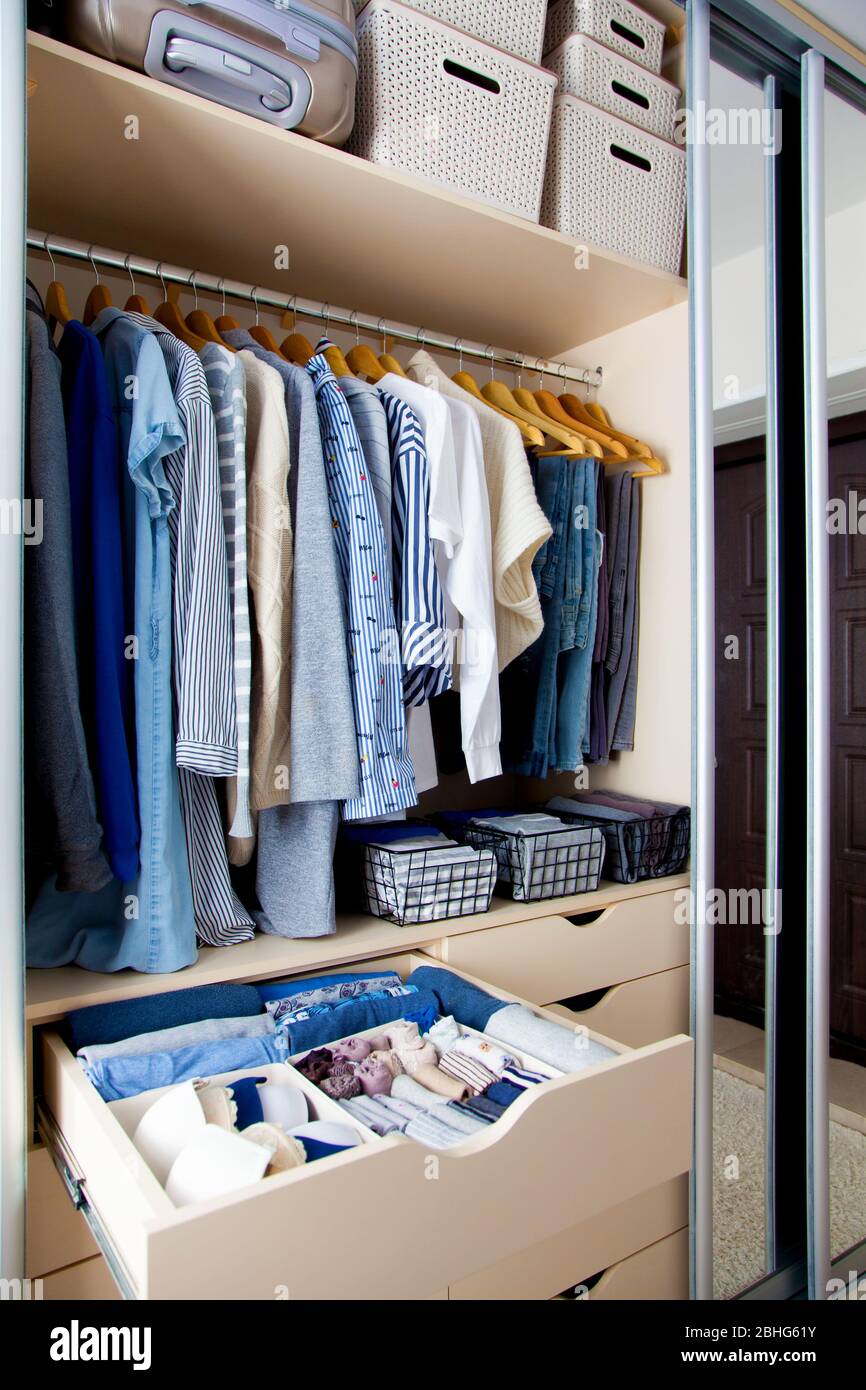 Wardrobe with perfect order clothes shades Stock Photo - Alamy