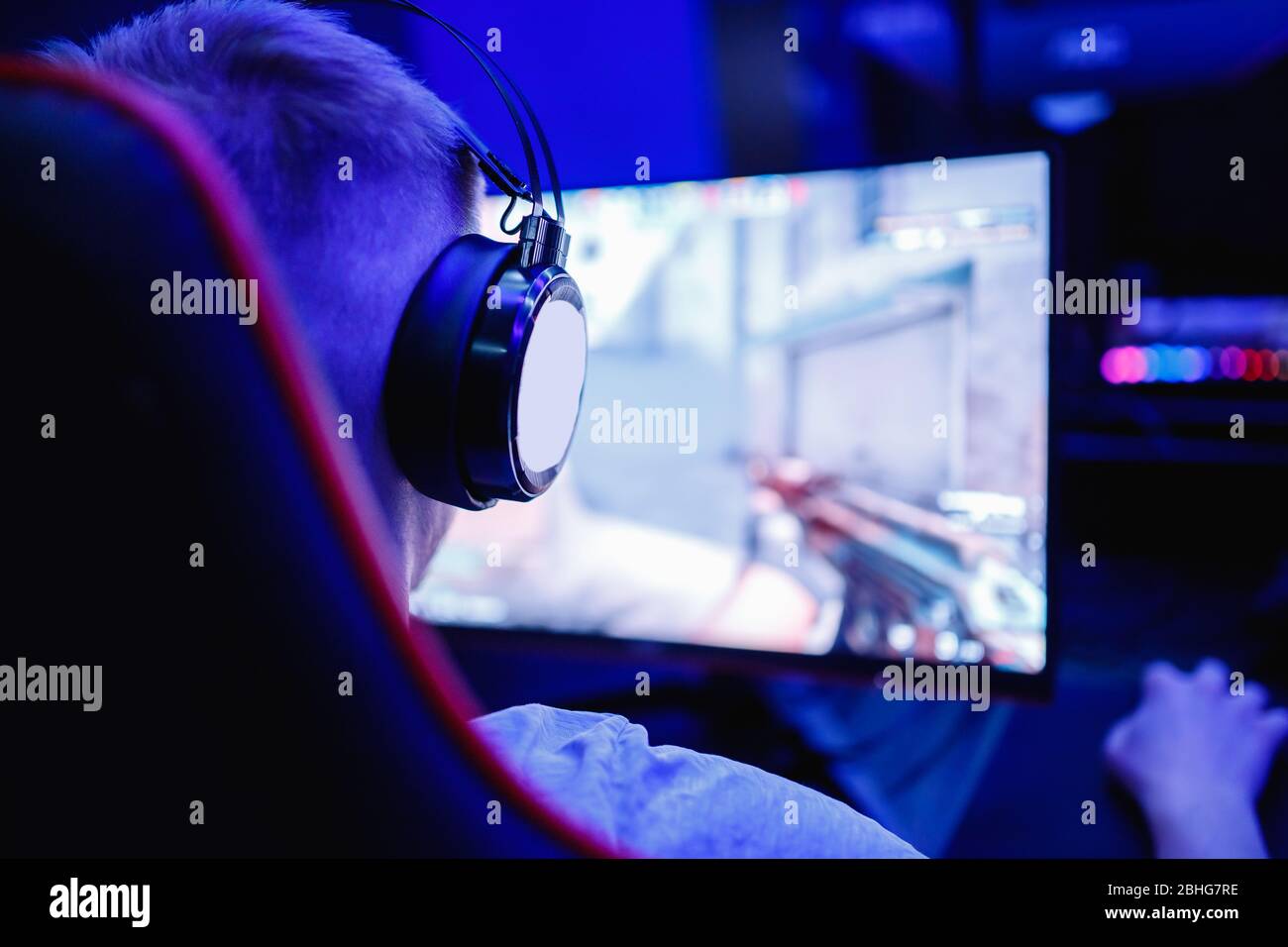 Streamer professional gamer smile playing online games computer with ...