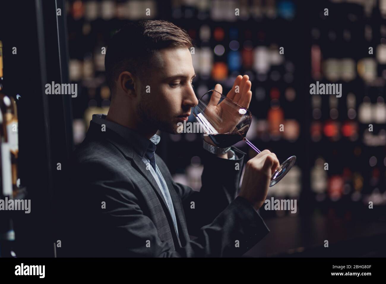 Man sniffing cork hi-res stock photography and images - Alamy