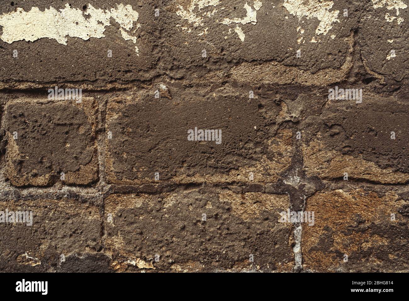 Fallen plaster on house wall background Stock Photo - Alamy