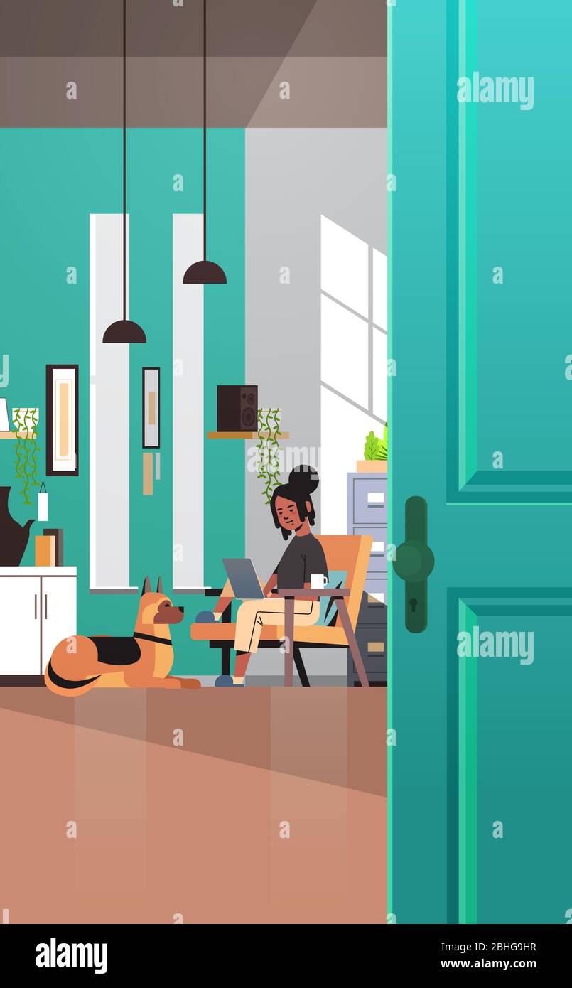 african american woman freelancer using laptop working at home during ...