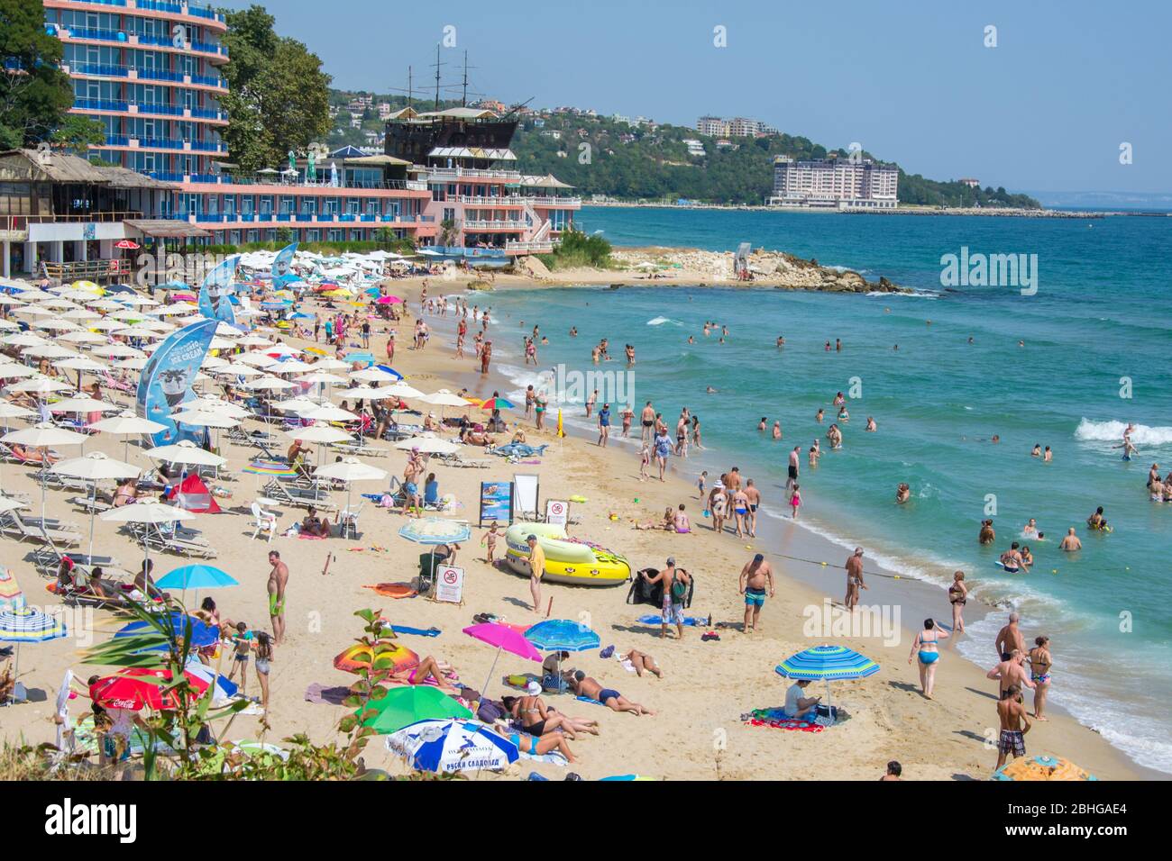 People enjoying the hot weather, beach fun, - holiday destination with ...