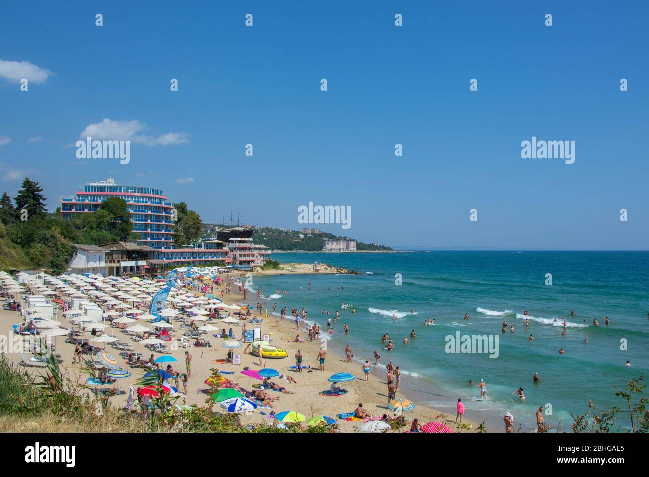 People enjoying the hot weather, beach fun, - holiday destination with ...