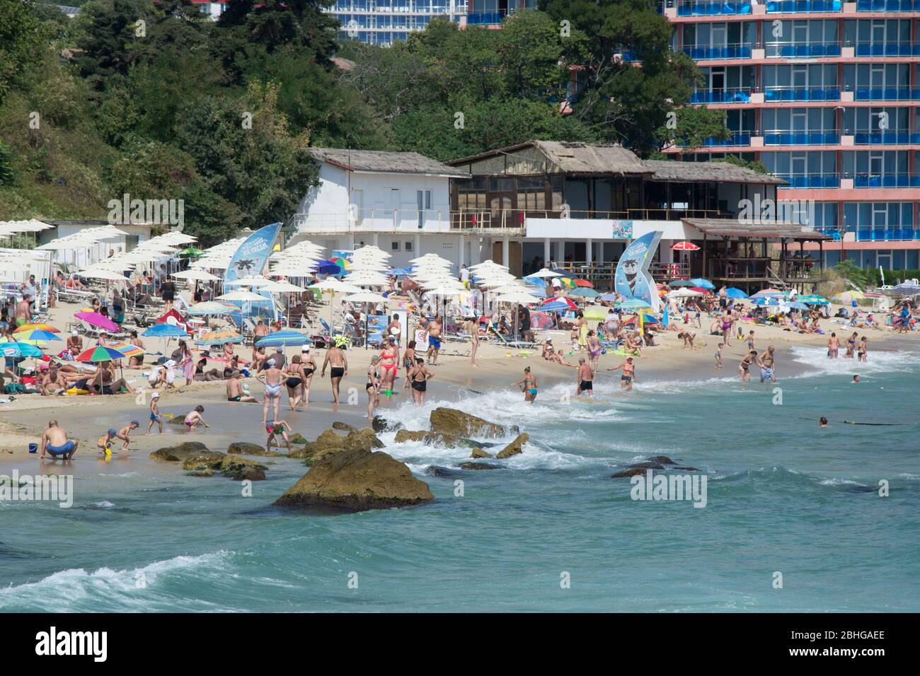 People enjoying the hot weather, beach fun, - holiday destination with ...